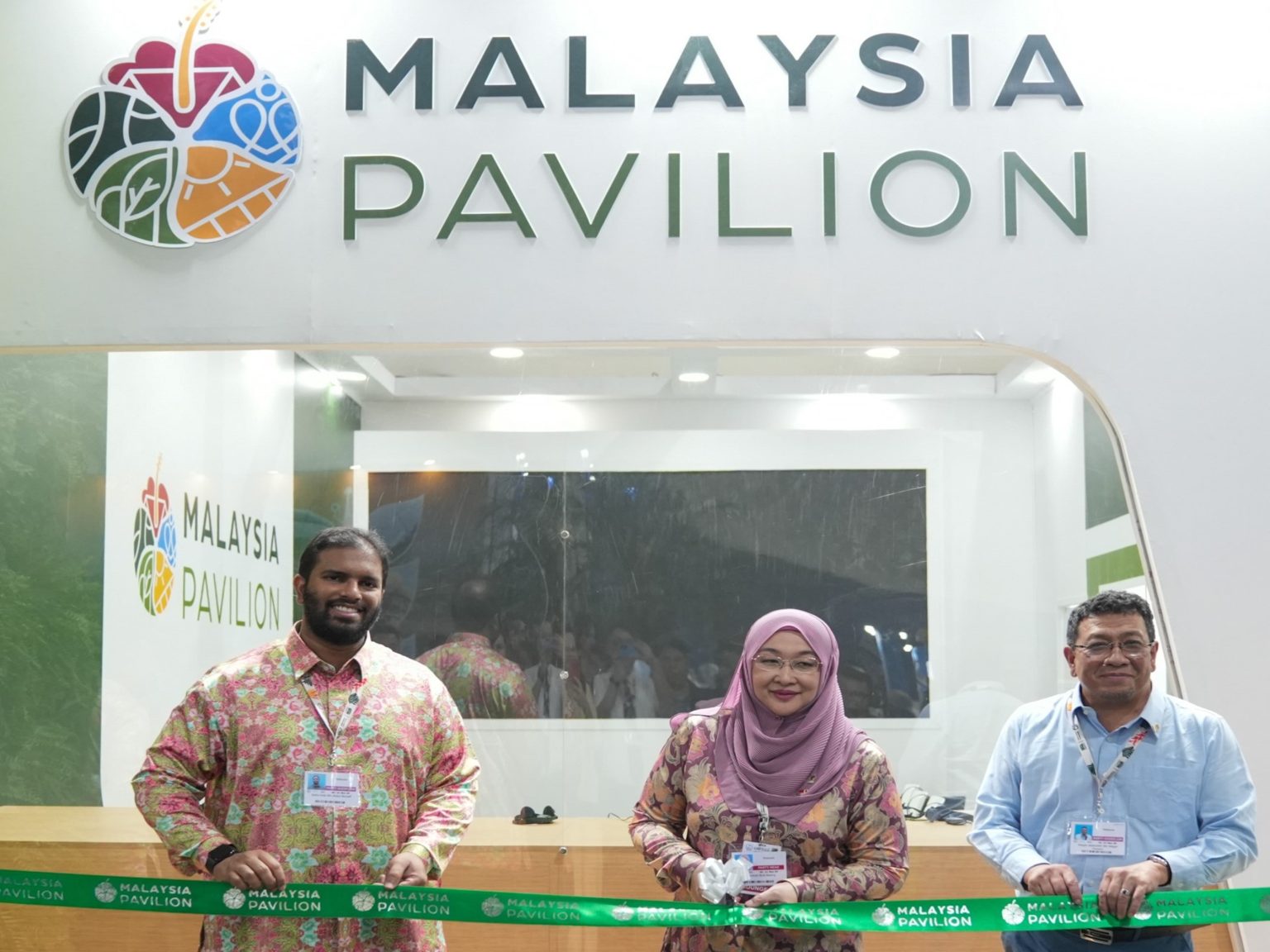 (from left to right) YBrs. Encik Saiful Adib bin Abdul Munaff, Acting ...